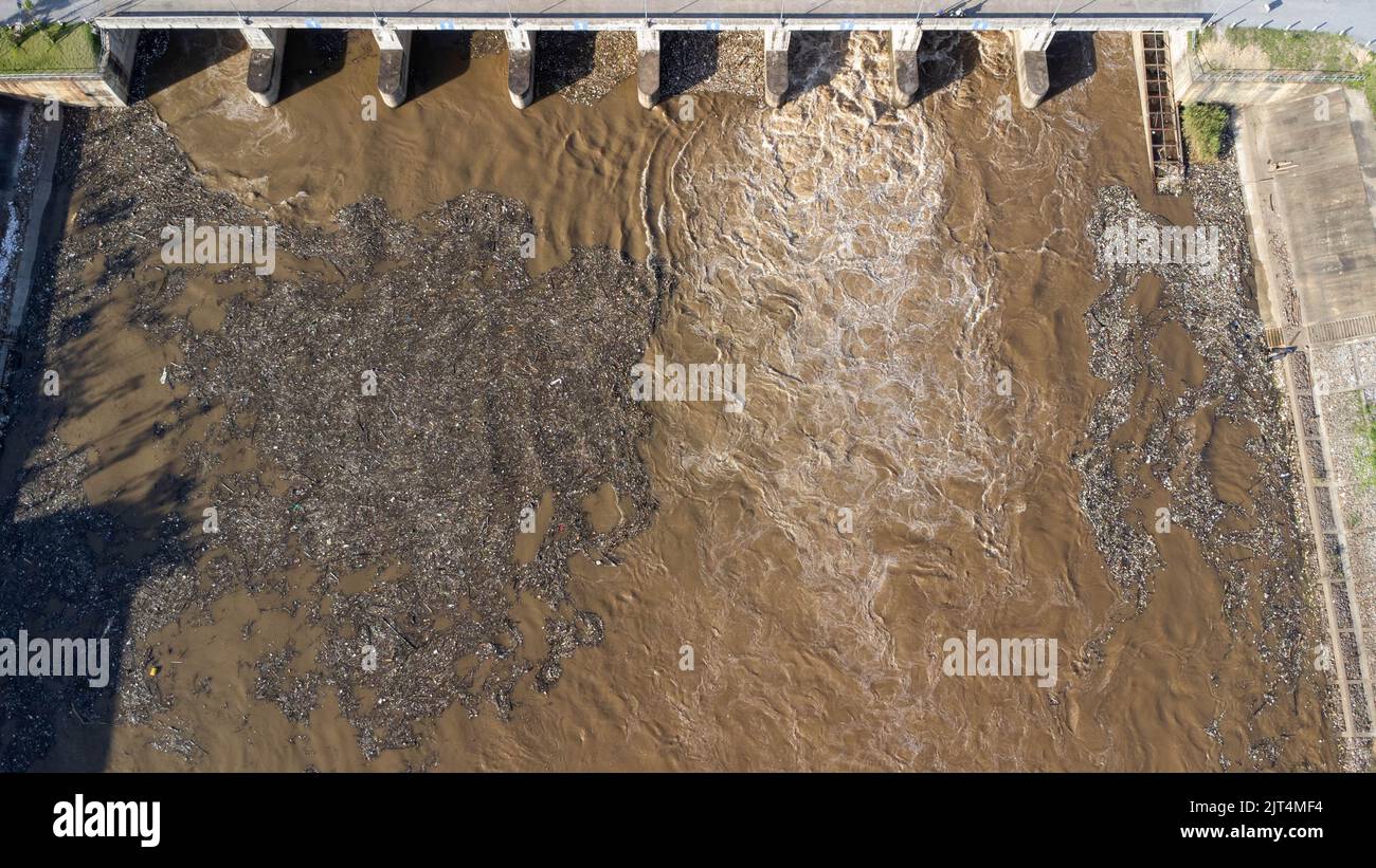 Aerial view of water released from the drainage channel of the concrete ...
