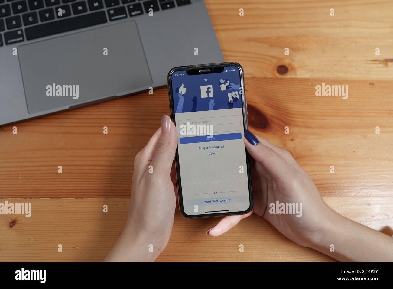 CHIANGMAI, THAILAND - AUG 26, 2022 : Asian woman holds smartphone with ...