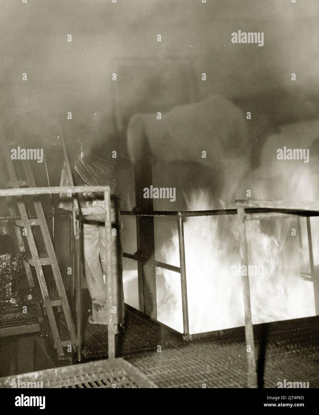 U.S Navy sailor at firefighting school near fire set for training ...