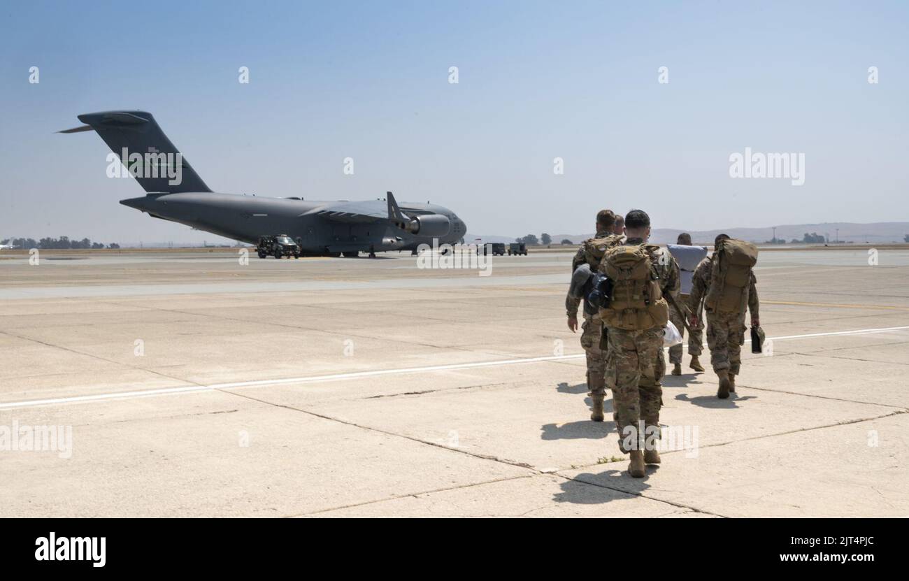 U.S. Airmen assigned to the 821st Contingency Response Group make their ...