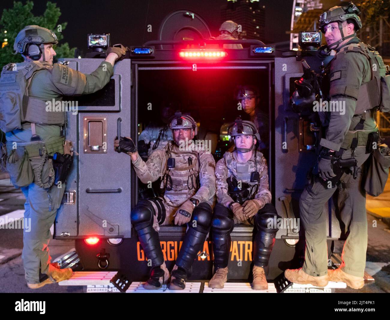 U.S. Airmen and Soldiers from the Georgia National Guard assist law ...