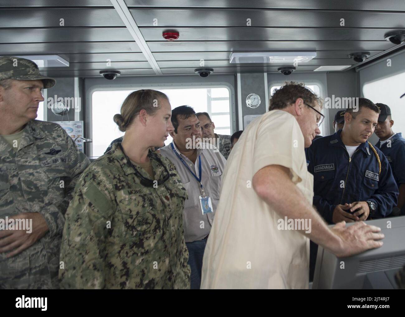 U.S. Ambassador to Honduras James D. Nealon, center right, and other U ...