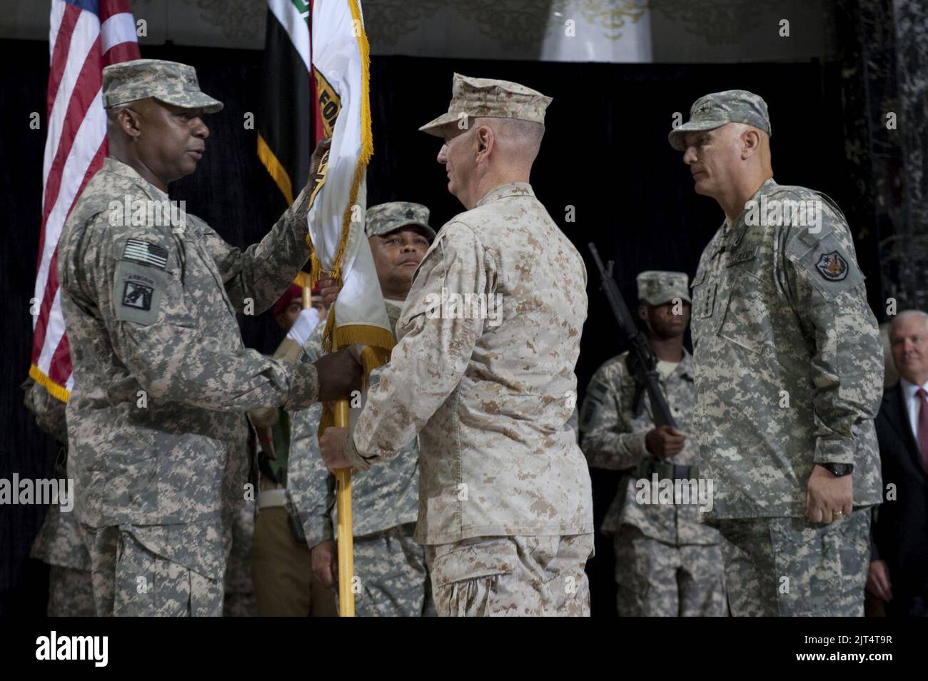 U.S. Army Gen. Lloyd J. Austin III, left, the incoming commander of U.S ...