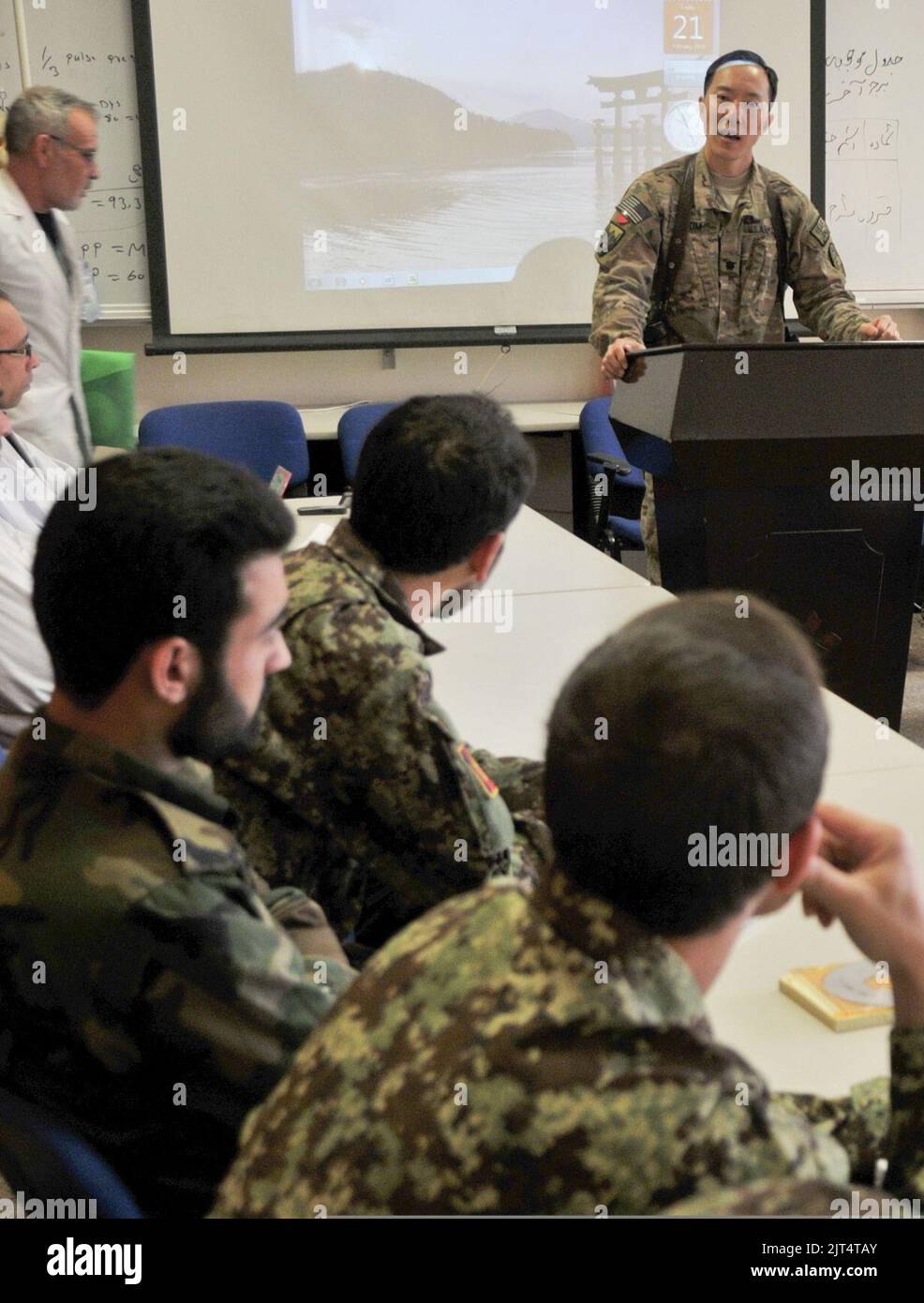 U.S. Army Lt. Col. Forest S. Kim, at lectern, the team leader of the ...