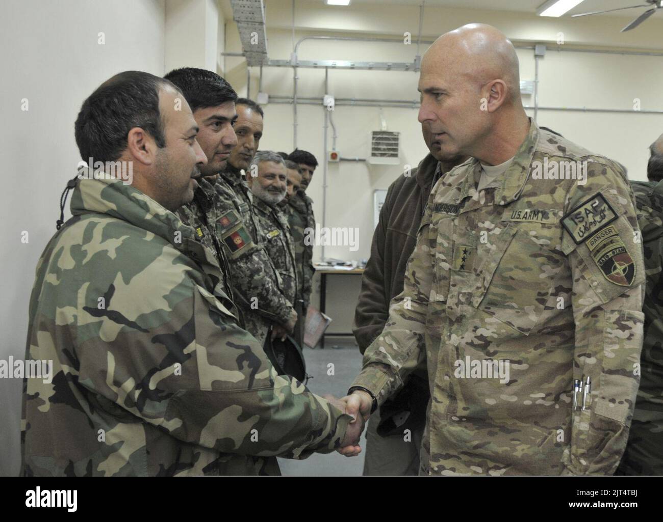 U.S. Army Lt. Gen. Joseph Anderson, right, the commander of the ...
