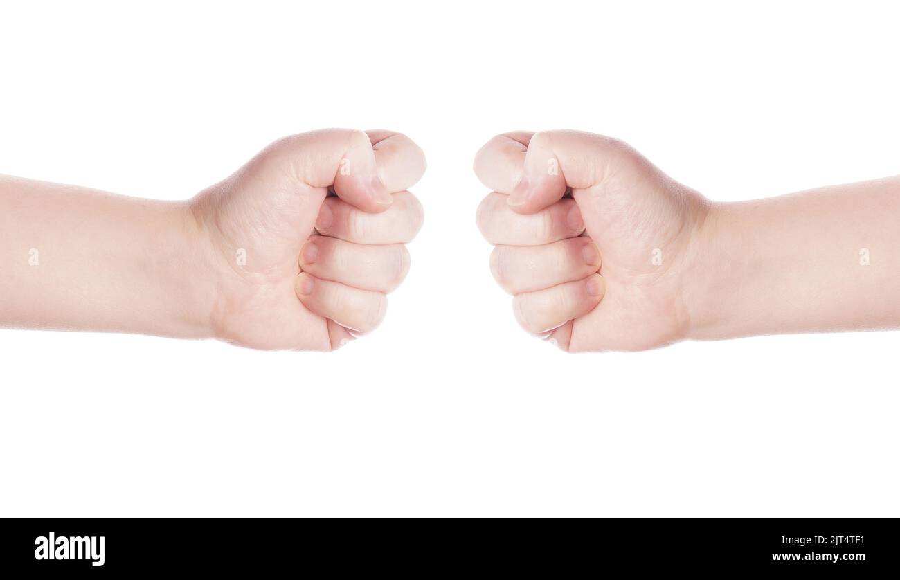 two opposing fists as symbol for conflict or fight Stock Photo - Alamy