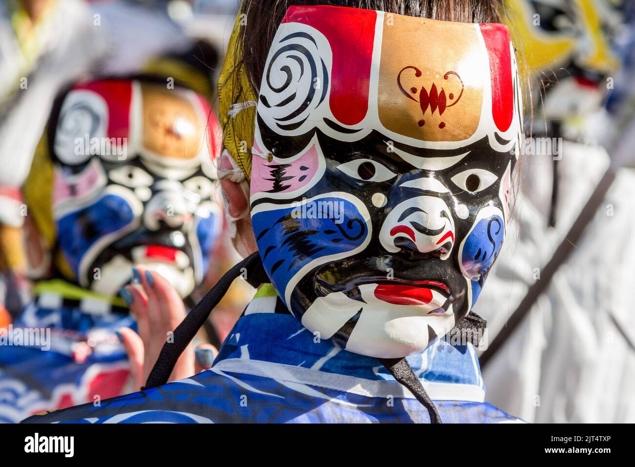 Tokyo, Japan. 27th Aug, 2022. Dancers wear masks on the back of their ...