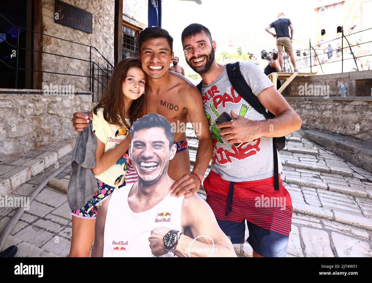 Athlet pose with fans during Red Bull Cliff Diving final competition at ...