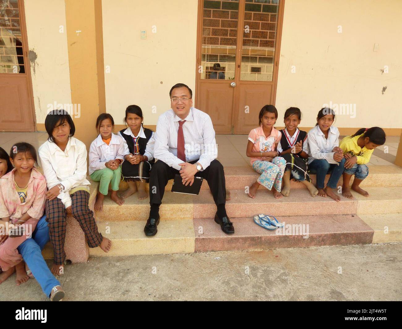 U.S. Consul General Le Thanh An visits with children at the Kon Ray ...