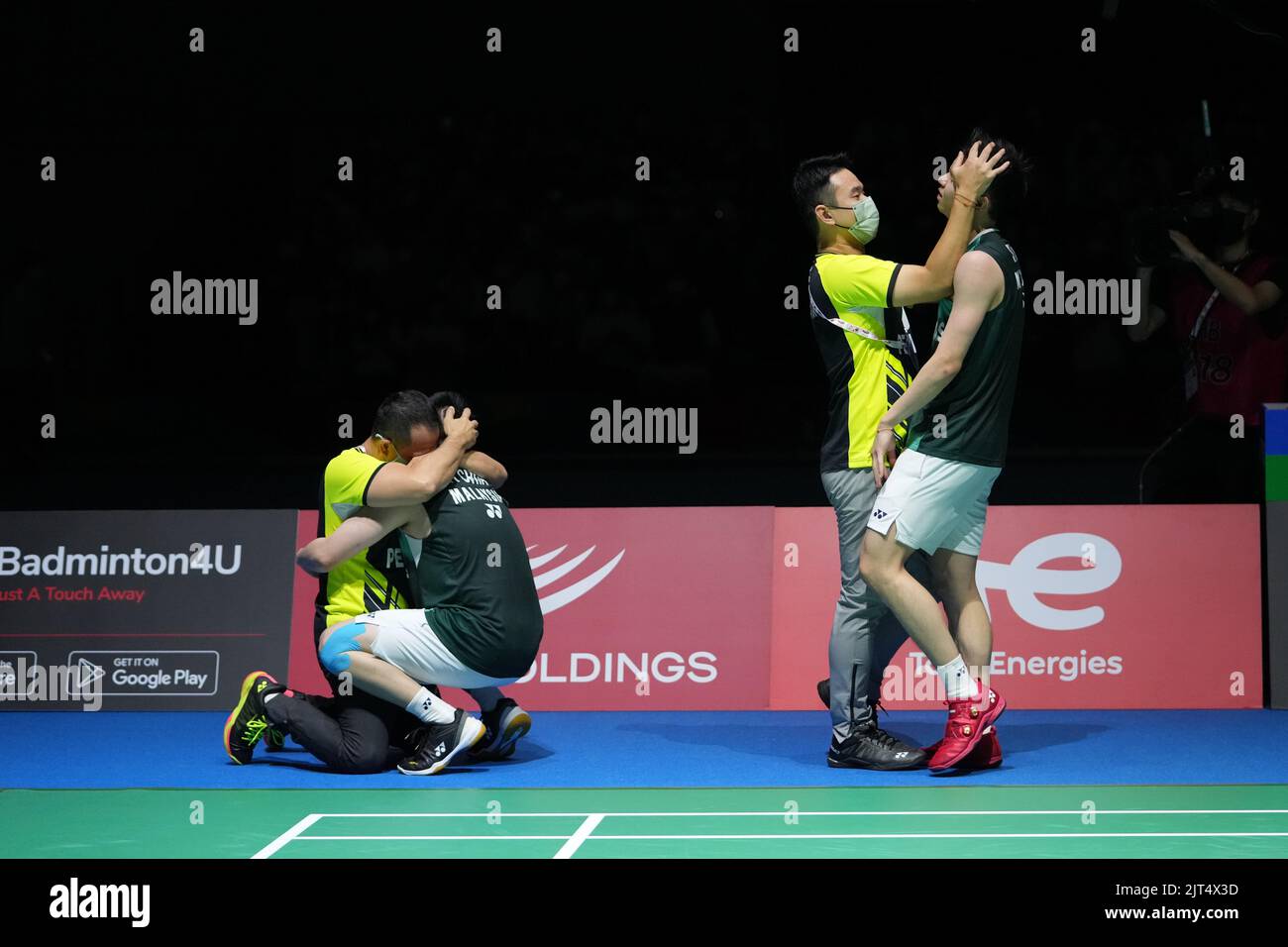 Tokyo, Japan. 28th Aug, 2022. Soh Wooi Yik (1st R)/Aaron Chia (2nd L) of Malaysia celebrate with ...