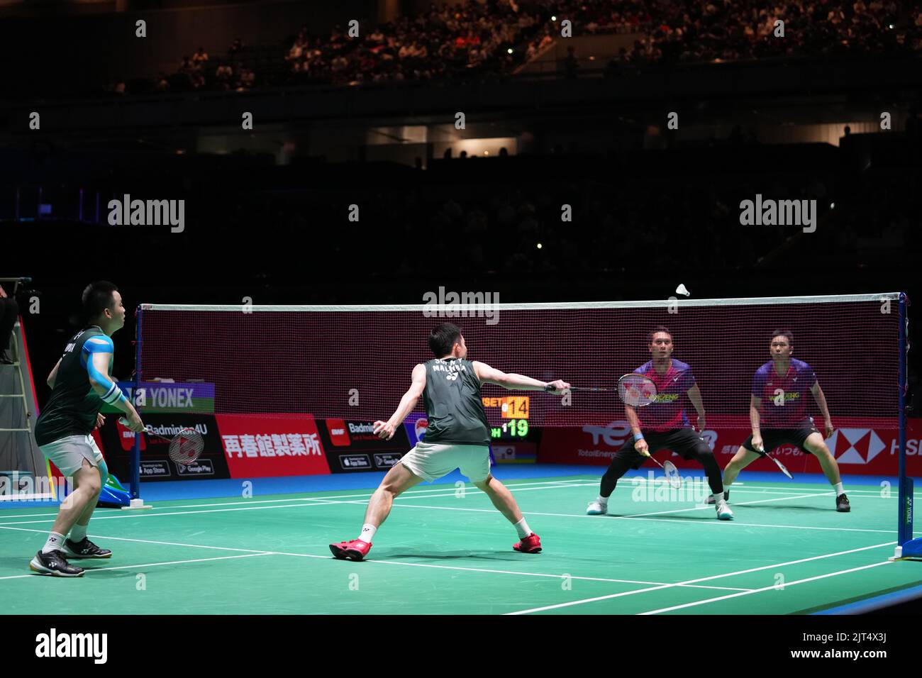 Tokyo, Japan. 28th Aug, 2022. Soh Wooi Yik (2nd L)/Aaron Chia (1st L) of Malaysia compete during ...