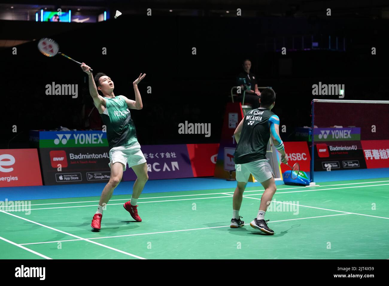 Tokyo, Japan. 28th Aug, 2022. Soh Wooi Yik (L)/Aaron Chia of Malaysia compete during the men's ...
