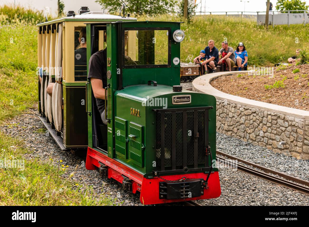A small electric train for children near the Olympia shopping center in ...