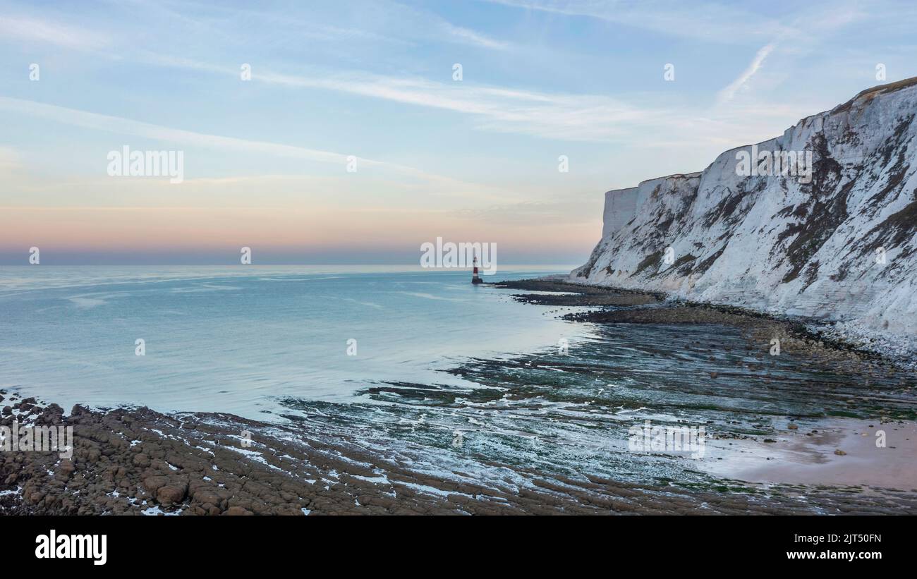Beautiful Summer sunrise landscape image of Beachy Head Lighthouse in ...