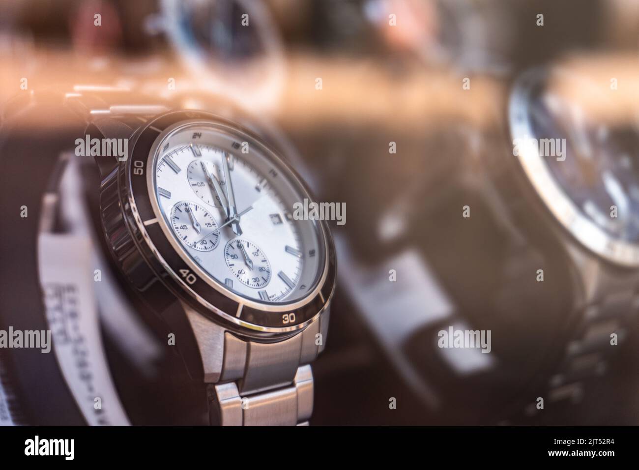 A closeup of a classic silver metallic watch Stock Photo - Alamy