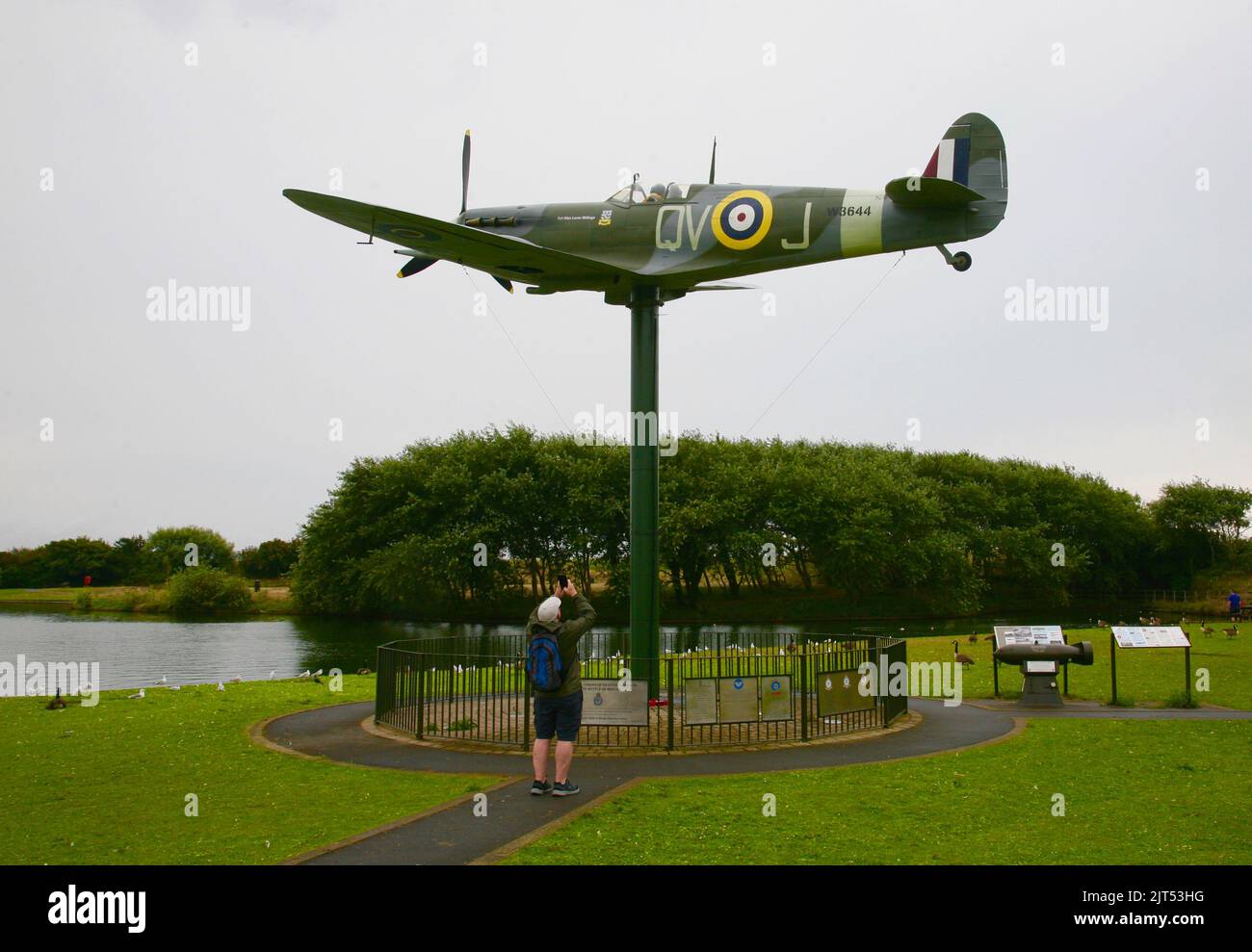 A photographer stands beneath the spitfire at Fairhaven Lake, Lytham St ...