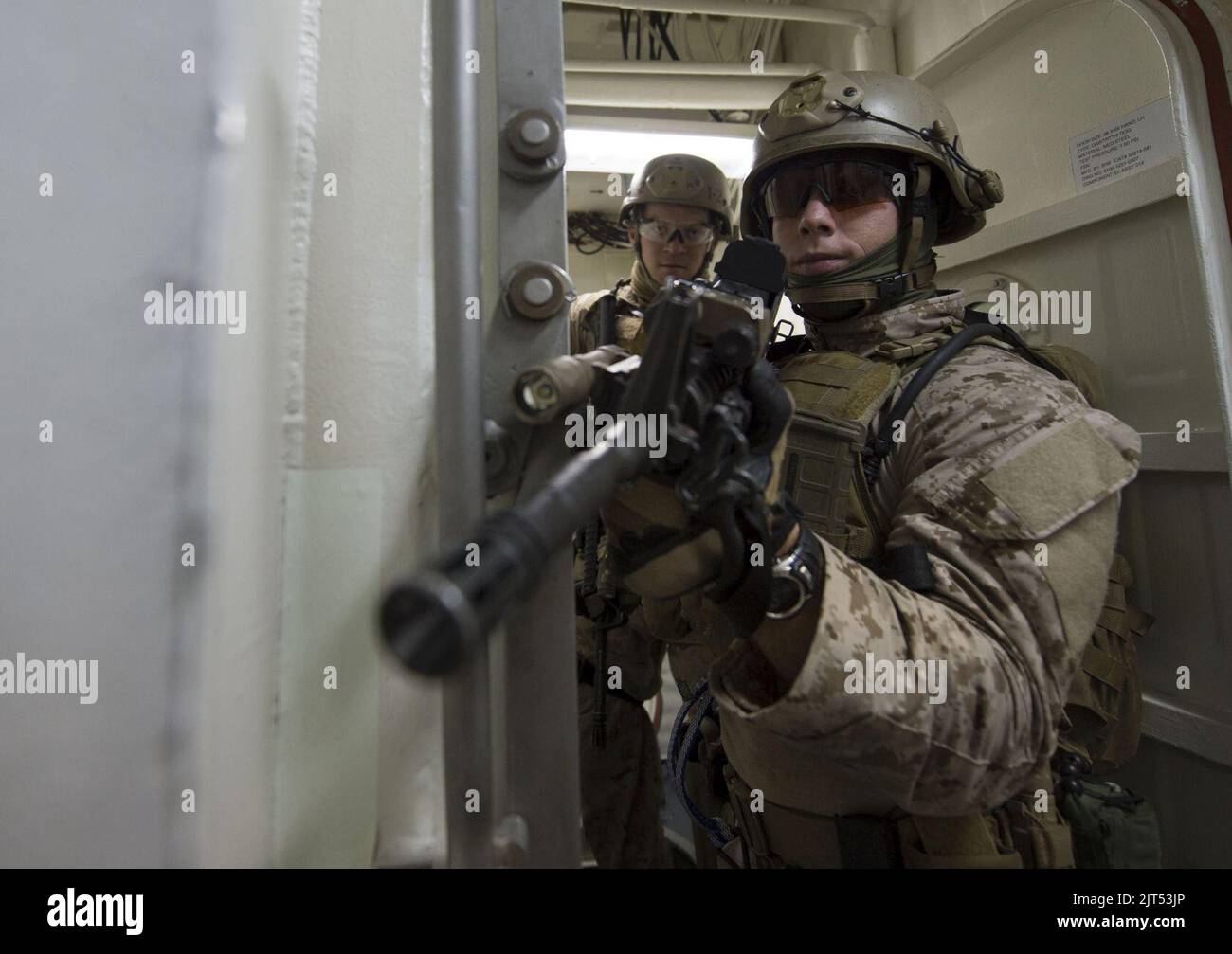 U.S. Marines assigned to the 13th Marine Expeditionary Unit embarked ...