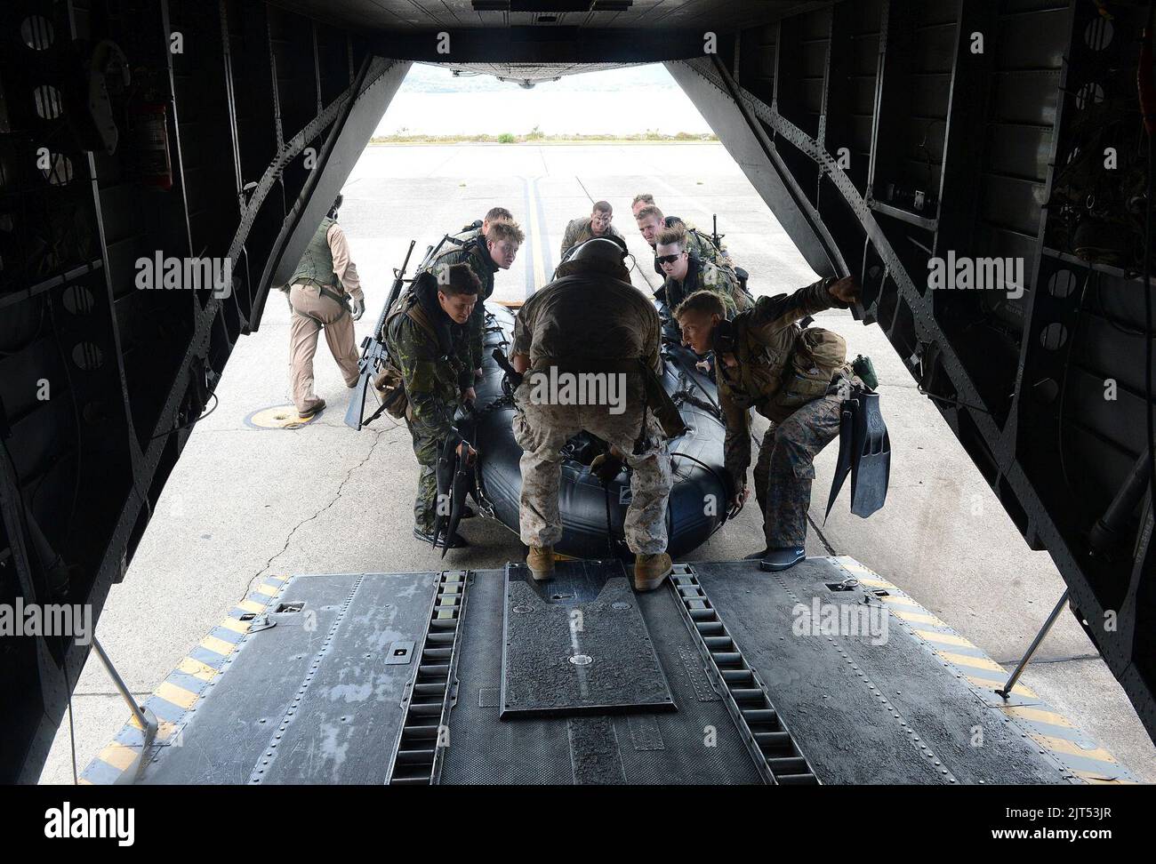 U.S. Marines assigned to the 3rd Marine Division, III Marine ...