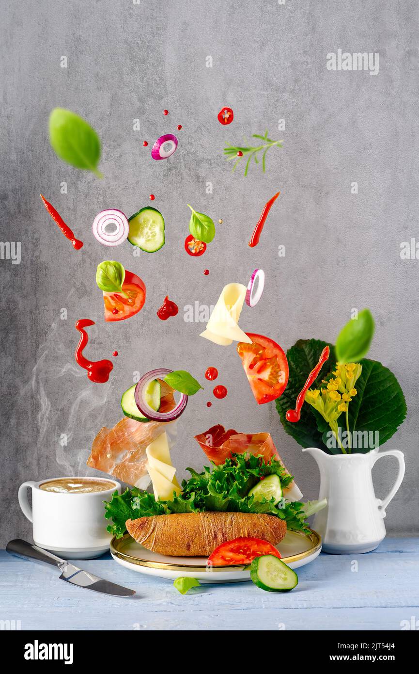 Ingredients of sandwich are falling in the ciabatta. Ciabatta Sandwich ...