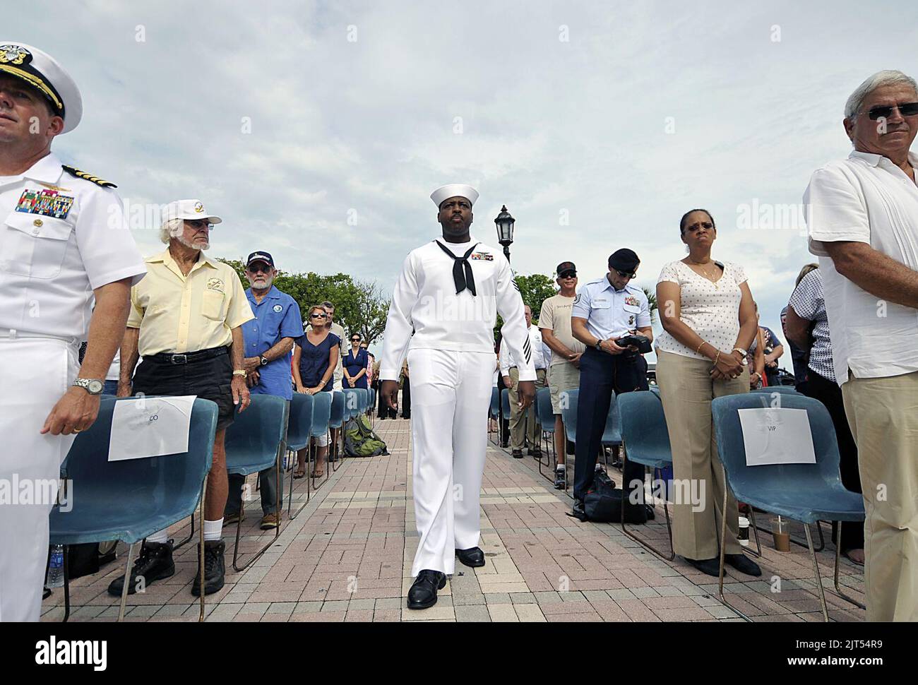 U.S. Navy Air Traffic Controller 1st Class center, sings ''God Bless ...