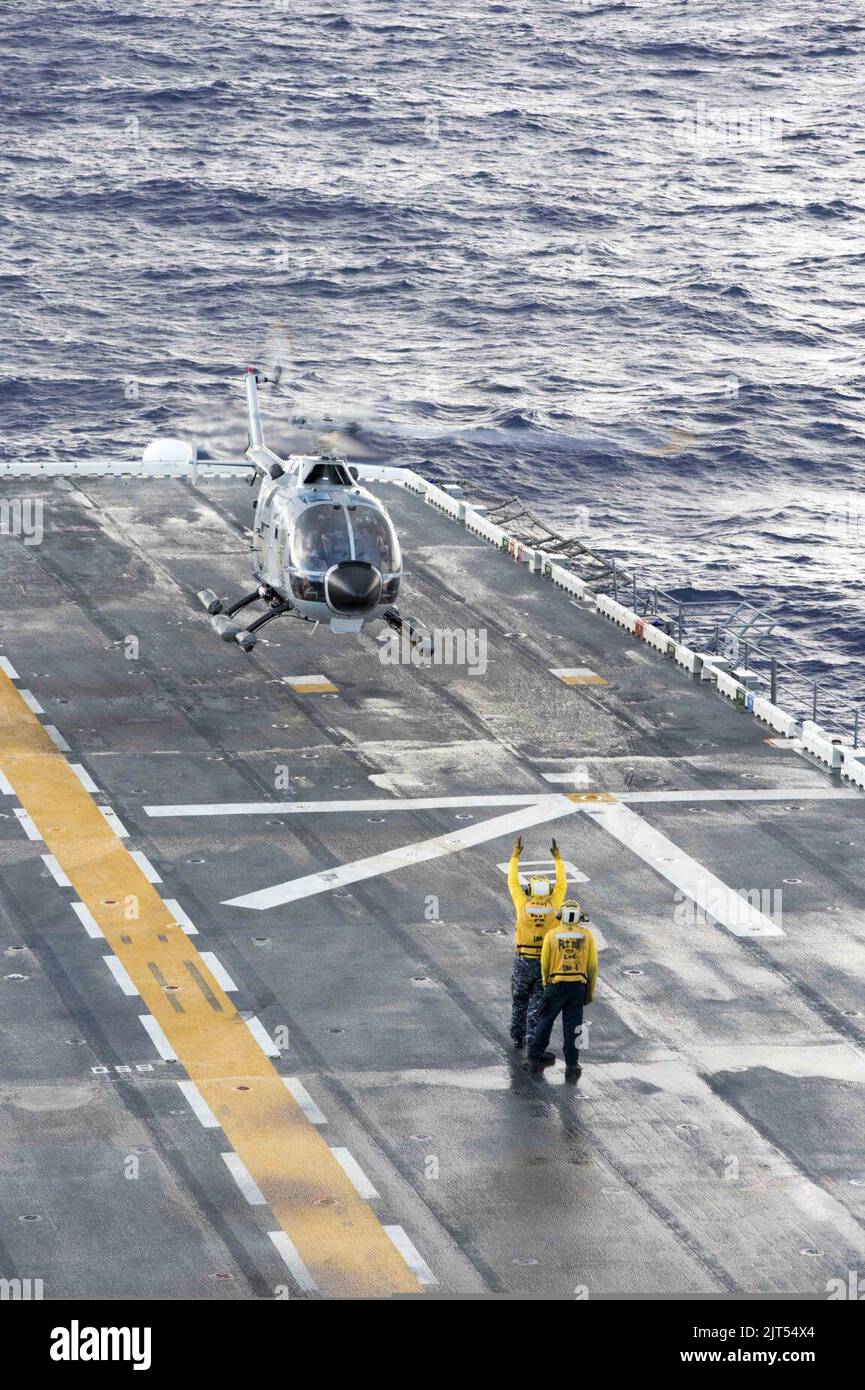 U.S. Navy Aviation Boatswain's Mate (Handling) 2nd Class launches a ...