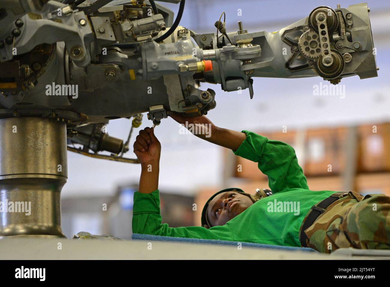 U.S. Navy Aviation Machinist's Mate 3rd Class assigned to Helicopter ...