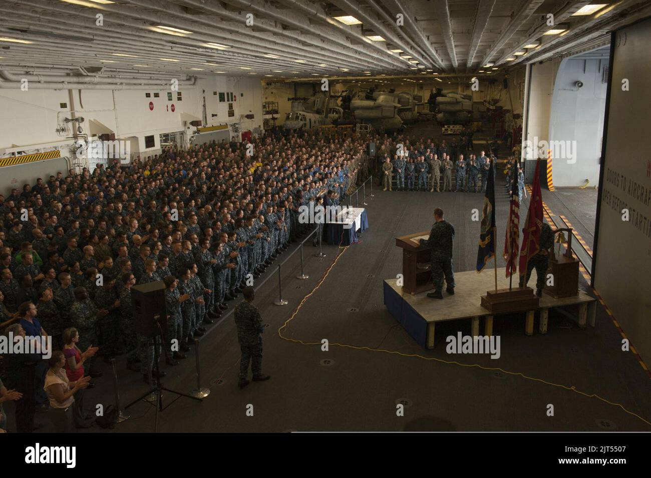 U.S. Navy Aviation Electronics Technician 1st Class at lectern ...