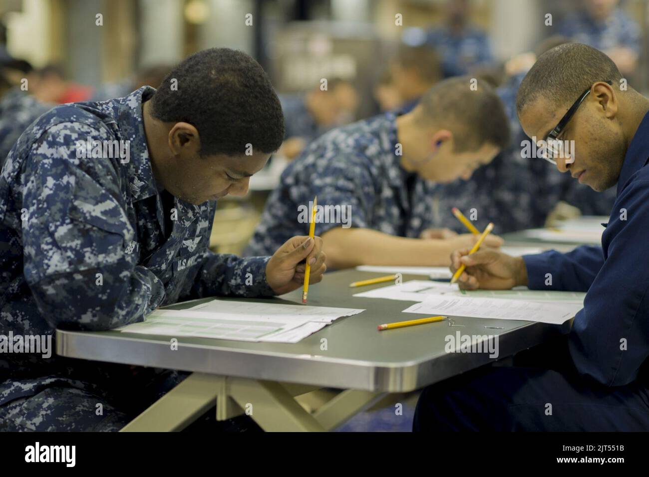 U.S. Navy Aviation Maintenance Administrationman 2nd Class left, takes ...