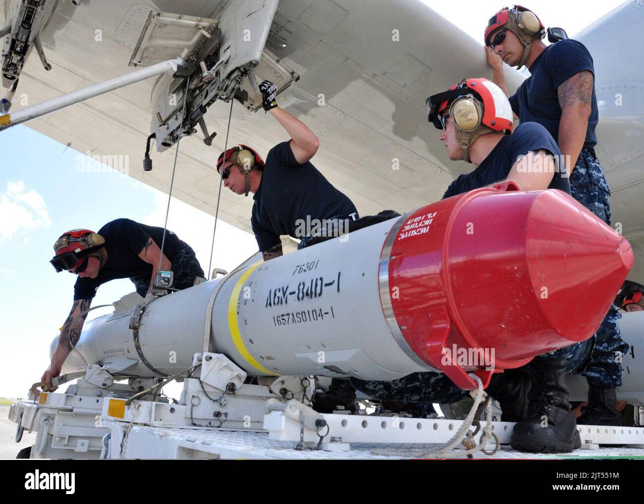 U.S. Navy aviation ordnancemen assigned to Patrol Squadron (VP) 47 ...