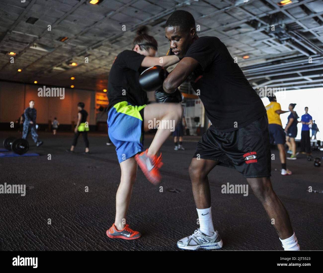 U.S. Navy Aviation Ordnanceman 3rd Class left, and Aviation Ordnanceman ...