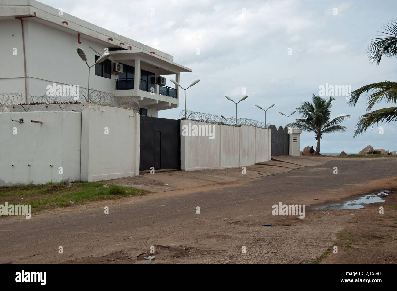 Wall around building with barbed wire, Sinkor, Monrovia, Liberia Stock ...