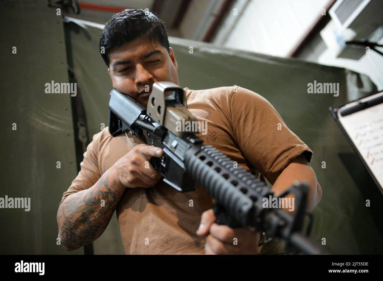 U.S. Navy Boatswain's Mate 1st Class assigned to Commander, Task Force ...