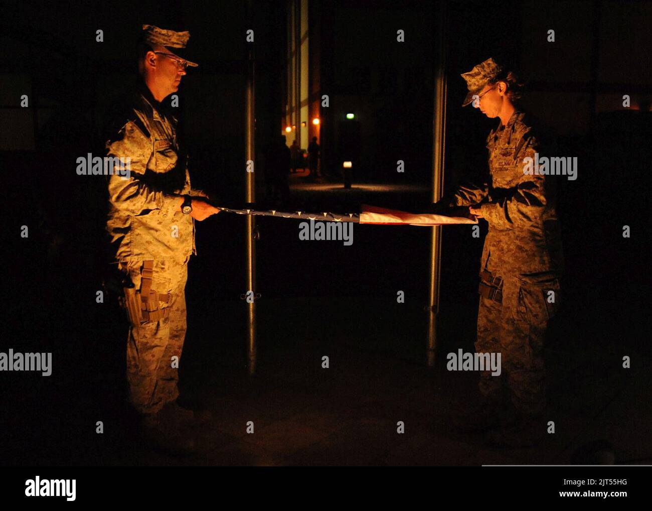 U.S. Navy Builder 1st Class left, and Logistics Specialist 1st Class ...