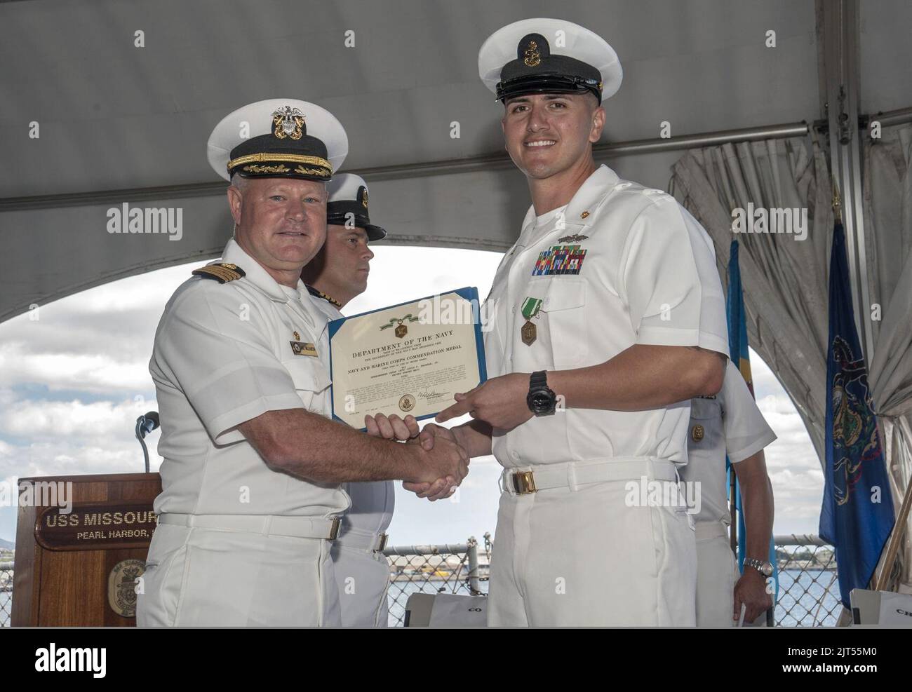 U.S. Navy Capt. left, the commander of Naval Facilities Engineering ...