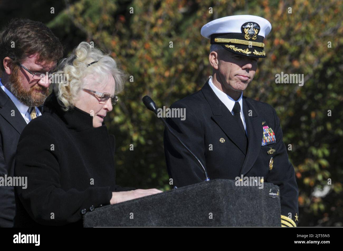 U.S. Navy Capt. right, the commanding officer of the aircraft carrier ...