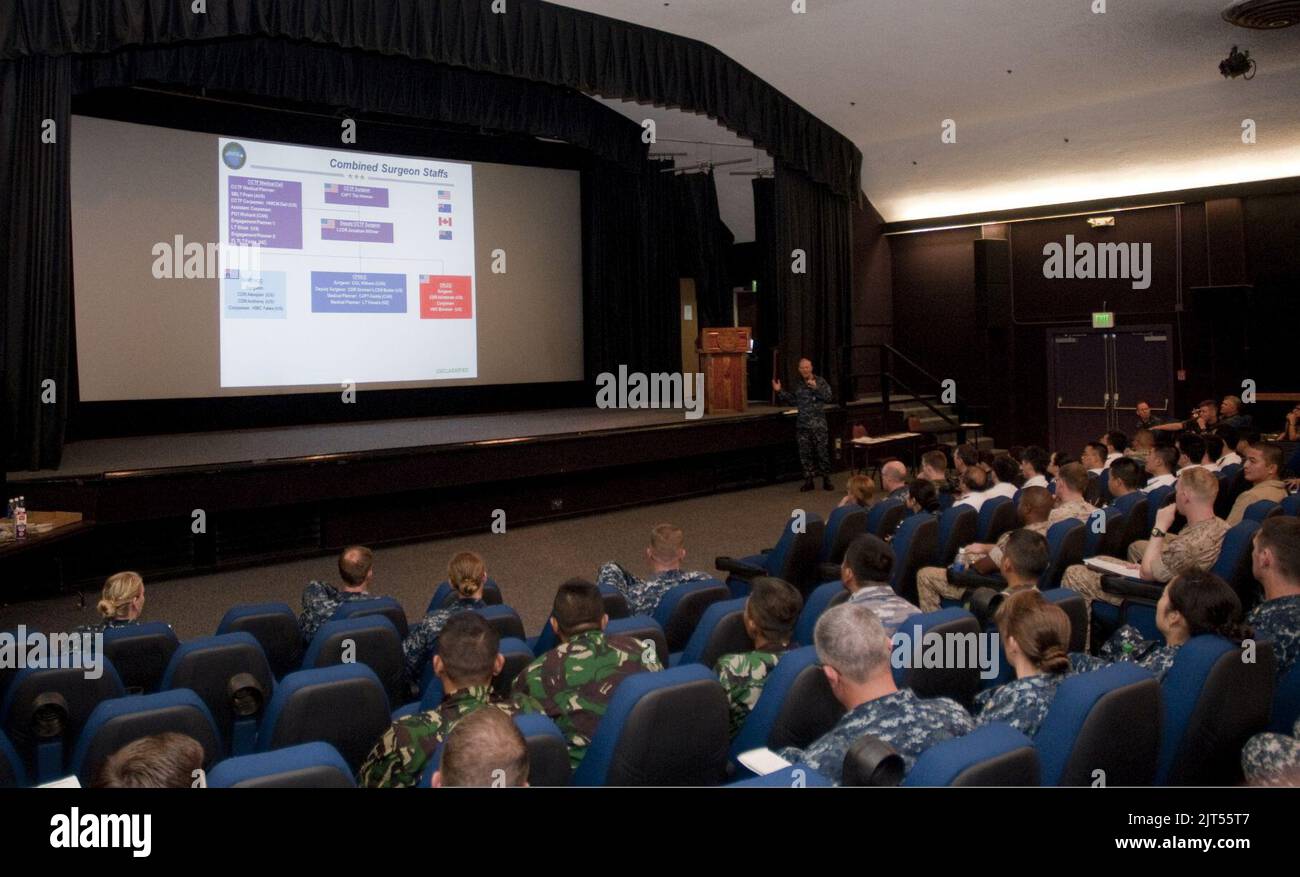 U.S. Navy Capt. the commander of Combined Task Force Surgeon, speaks ...