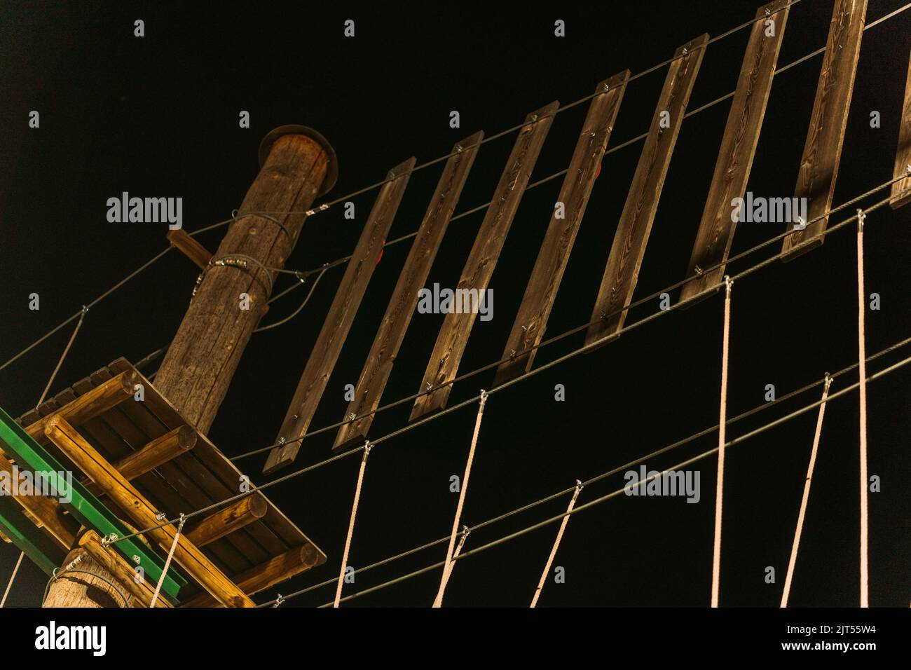 Fun and hard adventure park captured in the nighttime Stock Photo - Alamy