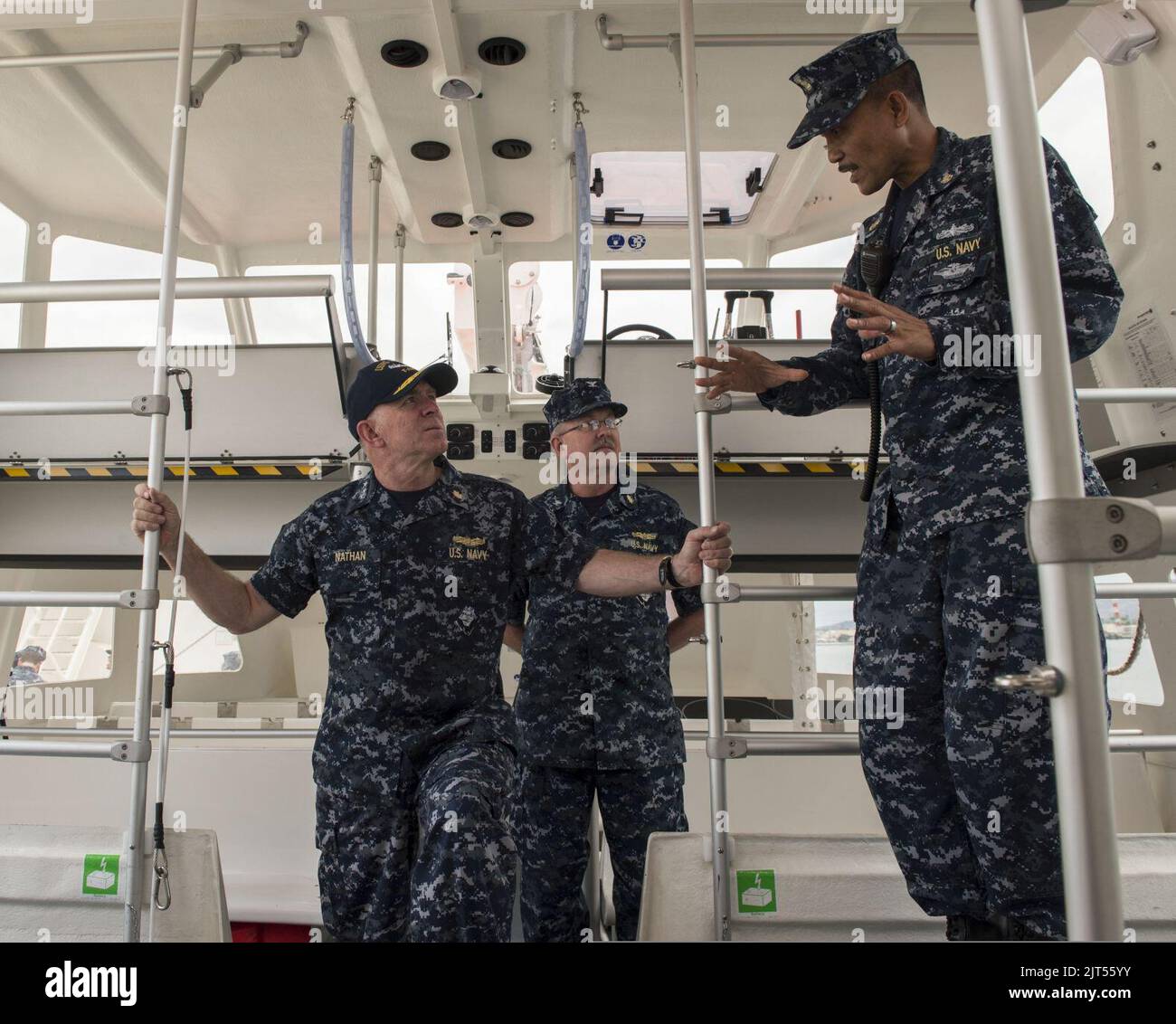 U.S. Navy Chief Hospital Corpsman right, discusses the capabilities of ...
