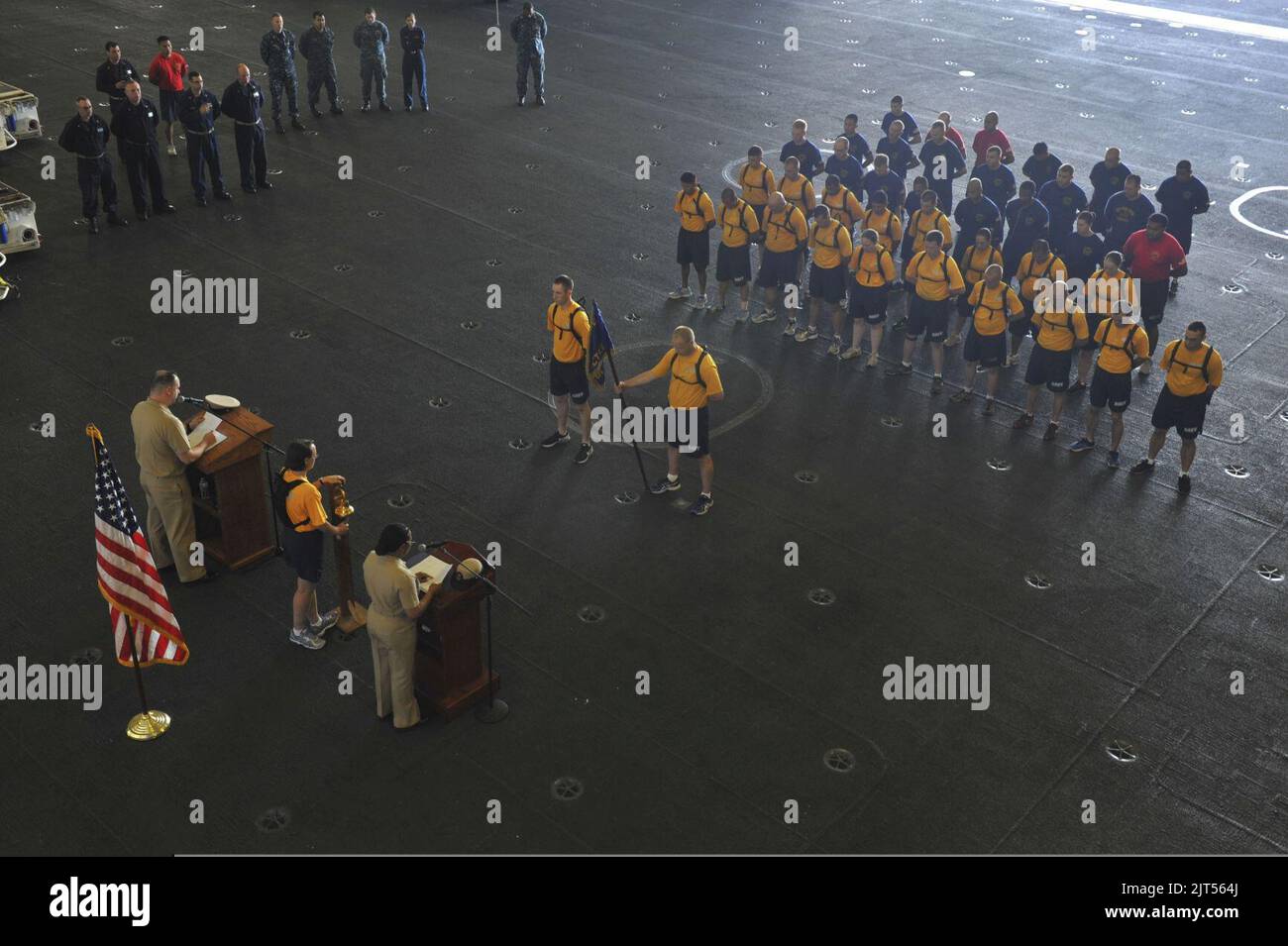 U.S. Navy chief petty officers and chief petty officer selectees listen ...