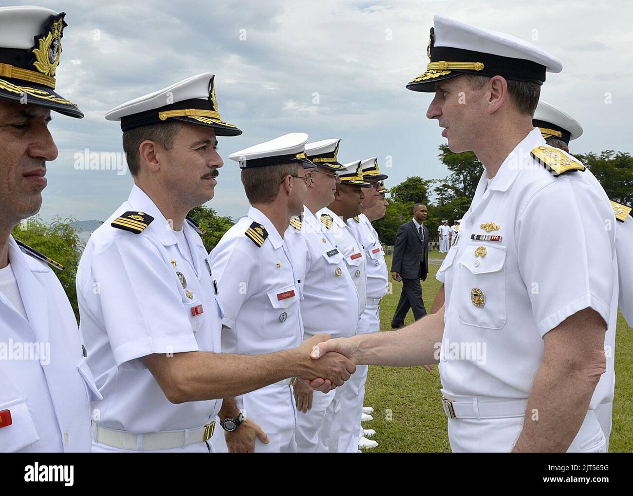 U.S. Navy Chief of Naval Operations Adm. Jonathan W. Greenert, right ...