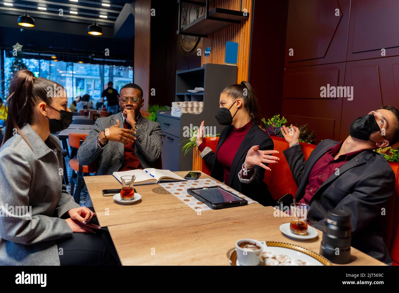 Group of multiracial busniess people are having a big discussion about ...