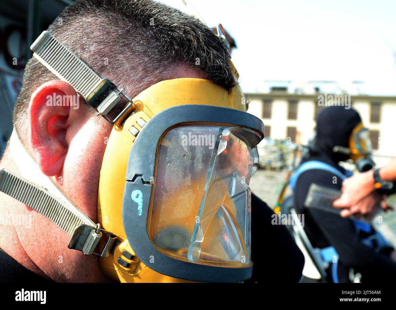 U.S. Navy Chief Warrant Officer 3 left, and Petty Officer 1st Class ...