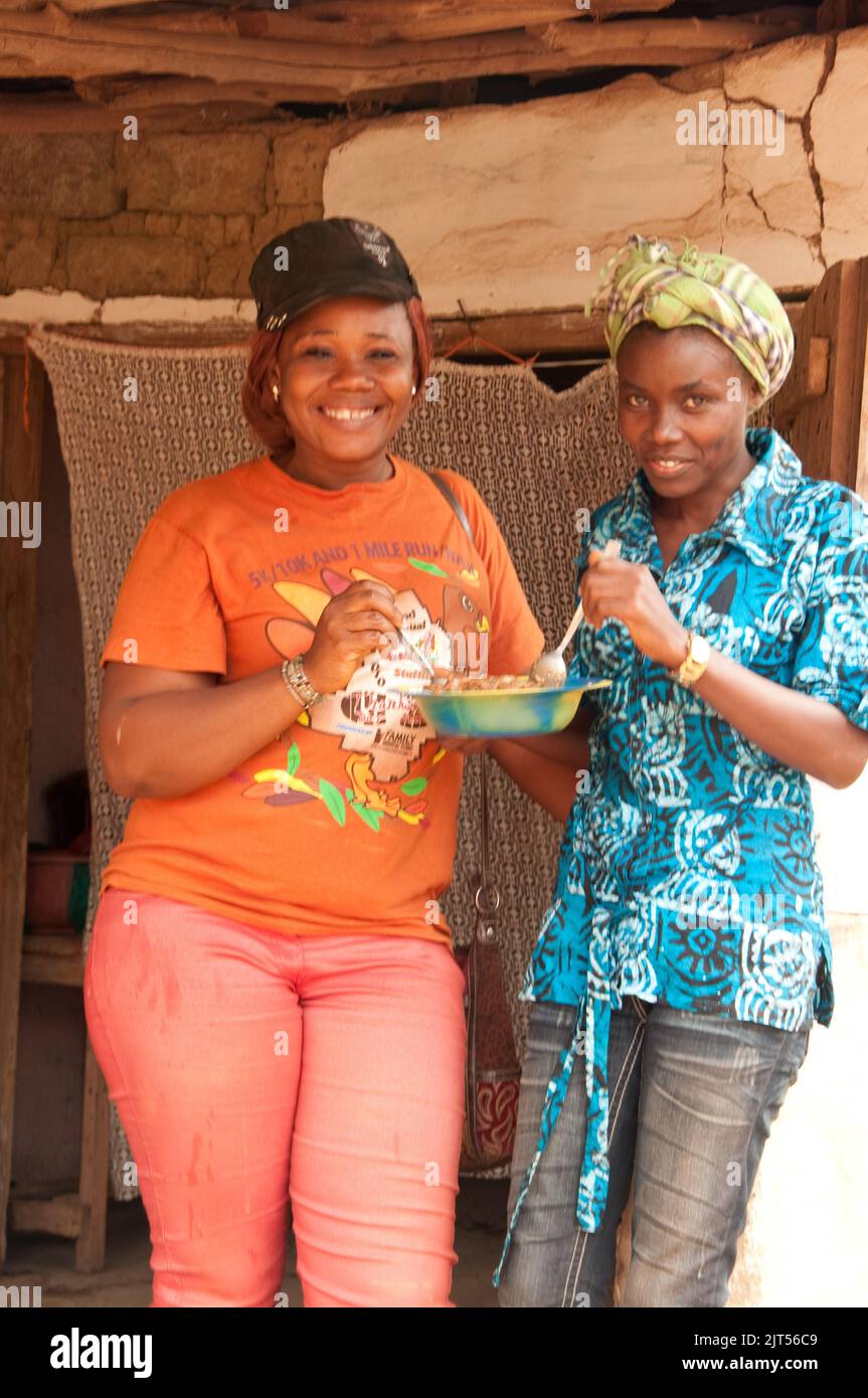 Young Ladies enjoying their lunch, Gbanga Market, Gbanga, Lofa County ...