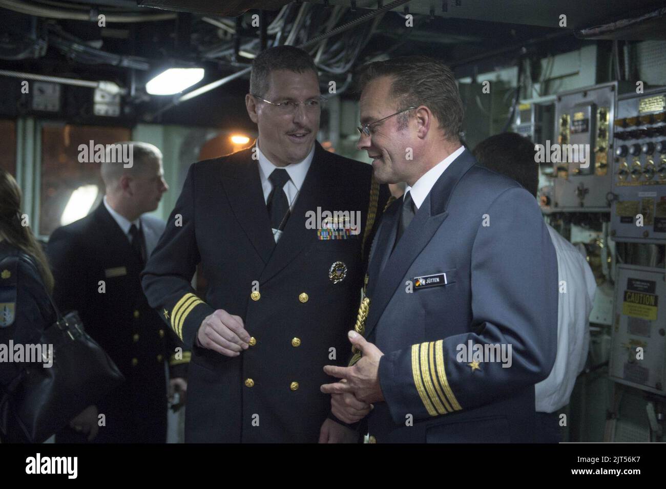 U.S. Navy Cmdr. Sean Maxwell, left foreground, and German navy Cmdr ...