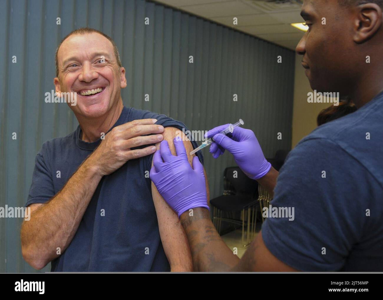 U.S. Navy Command Master Chief left, the command master chief of the ...