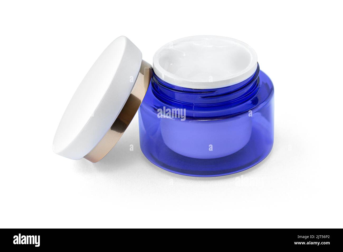 cosmetic cream in an open jar isolated on white background with ...