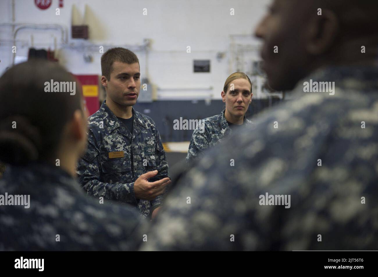 U.S. Navy Cryptologic Technician (Networks) 1st Class center left ...