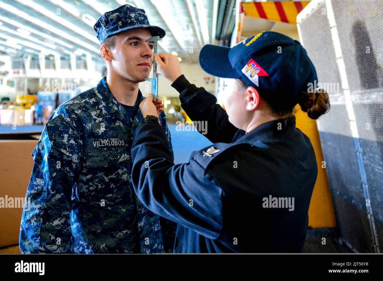 U.S. Navy Damage Controlman 3rd Class right, measures Damage Controlman ...