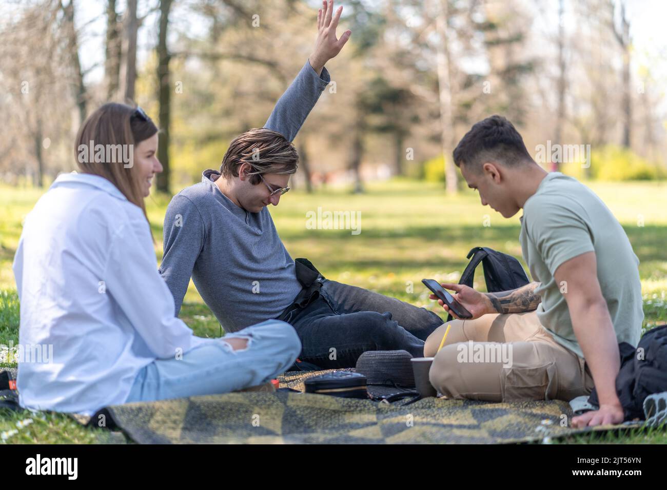 Male friends talking concert hi-res stock photography and images - Alamy