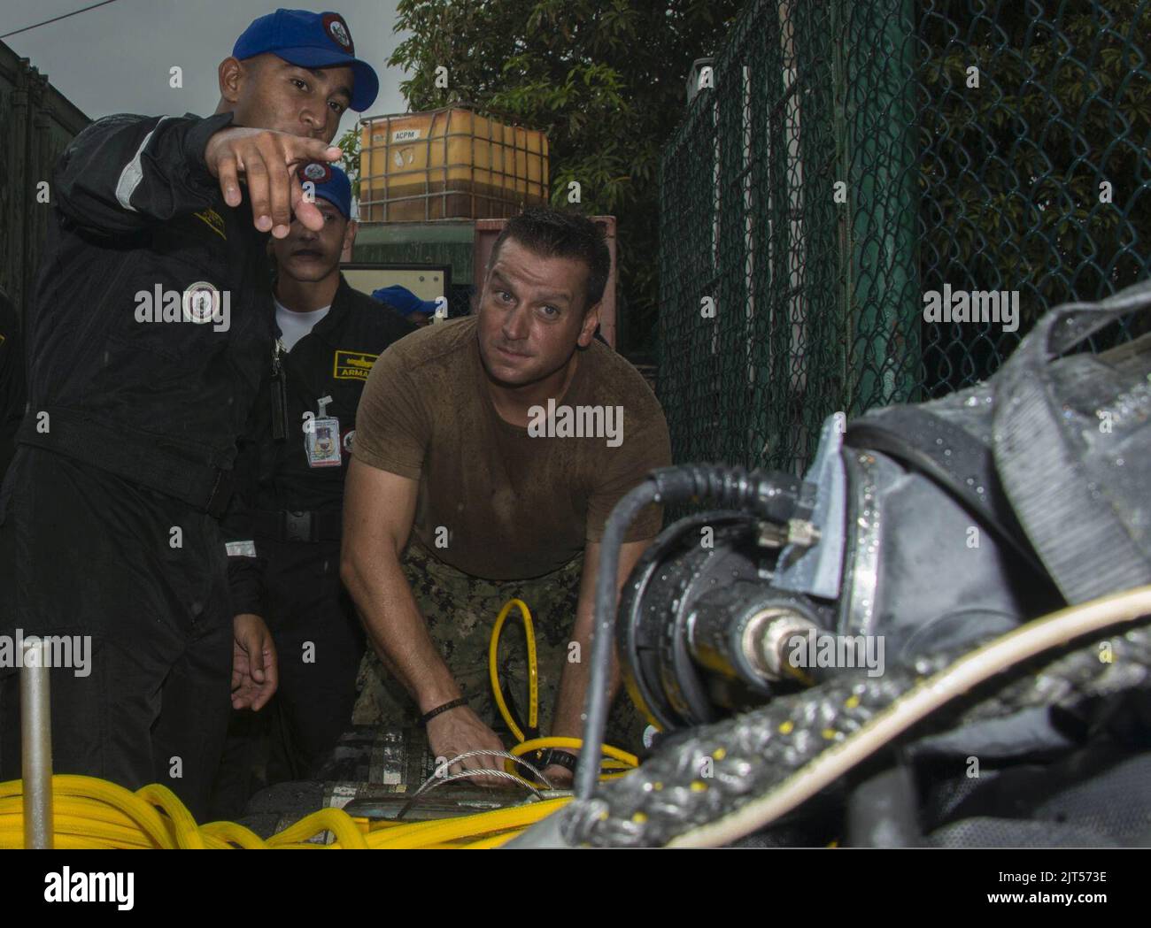 U.S. Navy Diver 1st Class center, assigned to Company 2-1, Mobile ...